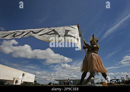 An Indian of the Amazonian Koruba tribe protests in Brasilia, Wednesday ...
