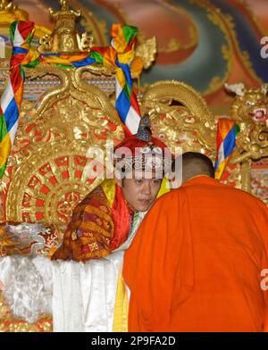 Bhutan's 5th King Jigme Khesar Namgyal Wangchuk, left, interacts with ...
