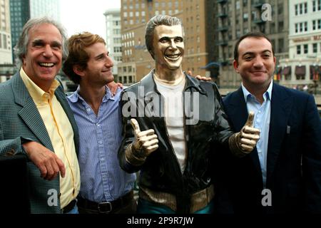 Actor Henry Winkler, left, poses with his sons Max Winkler, second left ...