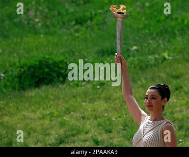 Greek actress Maria Nafpliotou, playing the role of a high priestess ...