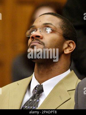 Former Canton police officer Bobby Cutts Jr., left, sits with attorney ...