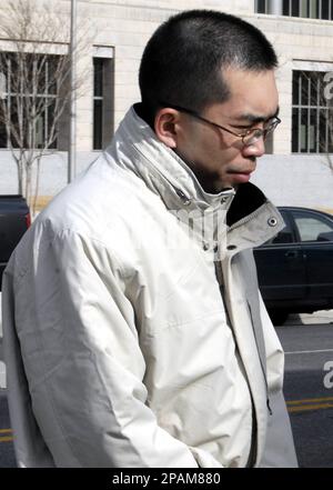 Patrick Chan , a neurosurgeon from Searcy, Ark., leaves the Little Rock ...
