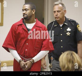 Former Canton police officer Bobby Cutts Jr., left, sits with attorney ...