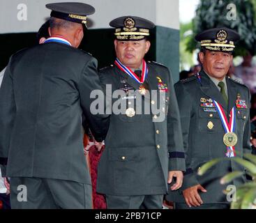 New Philippine Army chief Lt. Gen. Reynaldo Mapagu, right, and new ...