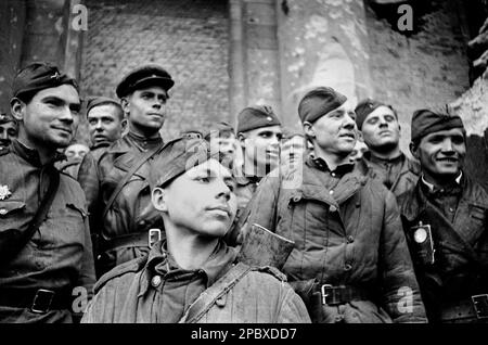 FILE - In this May 7, 1945 file photo, Gen. Alfred Jodl, center, signs ...