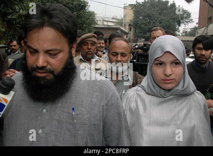 Sajad Ahmed Rana, center, father of Scottish girl Molly Campbell, also ...