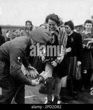 FILE - In this May 7, 1945 file photo, Gen. Alfred Jodl, center, signs ...