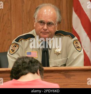 Neshoba County Sheriff Larry Myers, center, observes as Circuit Judge ...