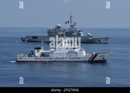 Philippine Coast Guard patrol vessel BRP Malapascua, left, goes near ...