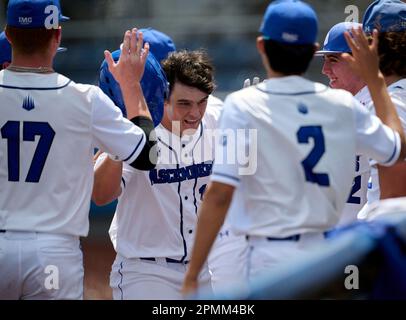 IMG Academy Ascenders Cade Ladehoff (14) rounds the bases after hitting ...