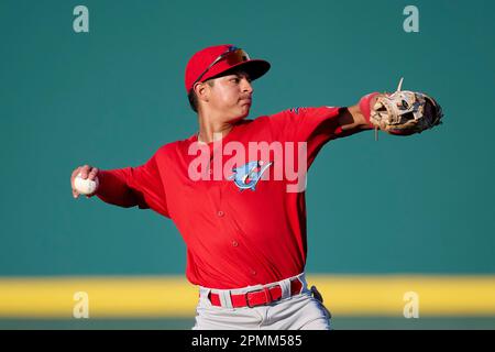 Clearwater Threshers shortstop Bryan Rincon (5) throws to first base ...