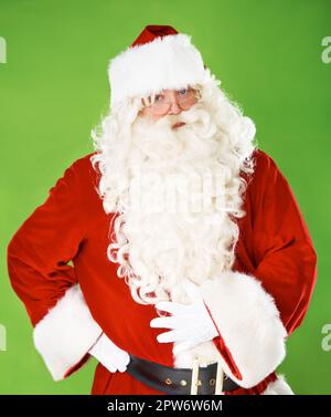 Des fêtes et des gâteries festives. Un père Noël entier frottant son ...