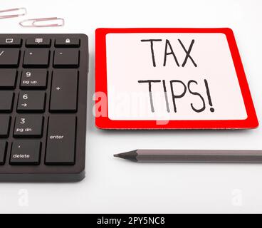 Signe texte montrant des conseils fiscaux. Photo d'affaires mettant en ...