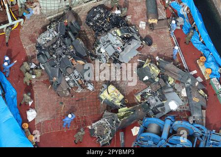 An aerial photo shows the wreckage of a sunken helicopter of the Japan ...