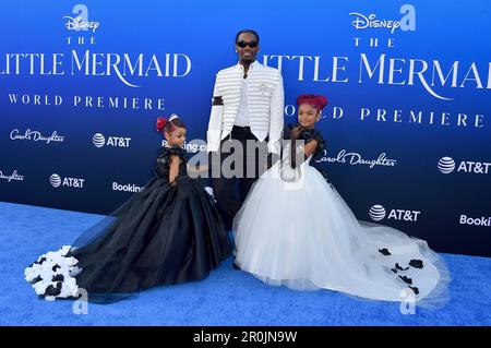 Offset, center, and daughters Kulture Kiari Cephus, left, and Kalea ...