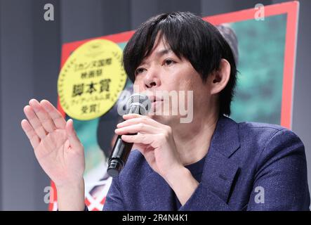 Japanese screenwriter Yuji Sakamoto speaks at a press conference after ...