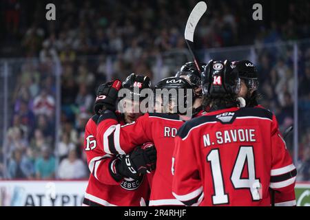 Quebec Remparts' Zachary Bolduc, right, checks Seattle Thunderbirds ...