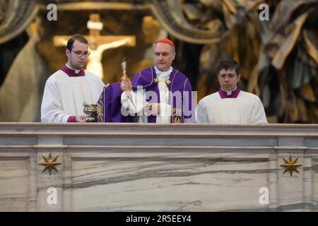 CORRECTS CARDINAL NAME - Cardinal Mauro Gambetti, center, blesses the ...