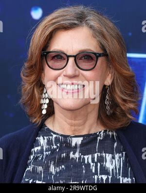 Dreamworks Animation president Margie Cohn poses with her husband Peter ...