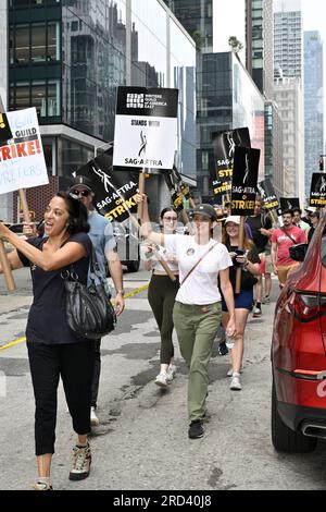 Actor/writer Tina Fey, right, and writer/producer Eric Gurian, center ...