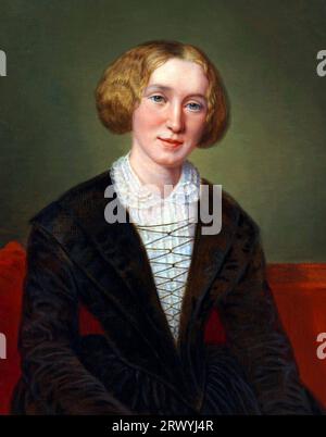 La statue de George Eliot (Mary Ann Evans) photographiée de nuit. La ...