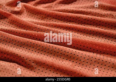 La texture des vêtements faits de fibres de polyester. Vêtements de ...