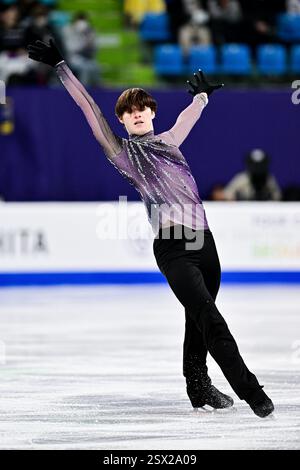 Douglas GERBER (AUS), pendant le patinage libre masculin, aux quatre ...