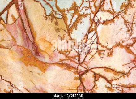 Un gros plan de pierre d'agate mettant en valeur ses couches vibrantes ...