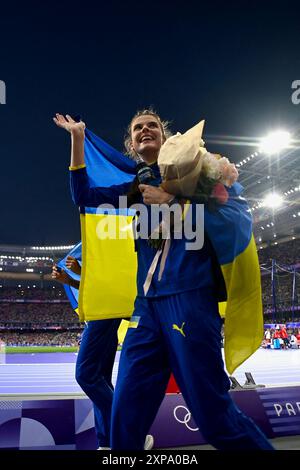 Gold medallist Yaroslava Mahuchikh of Ukraine celebrates on the podium ...