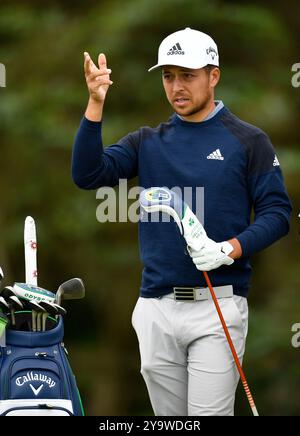 20 juillet 2019 ; Xander Schauffele discute avec Caddy Austin Kaiser ...