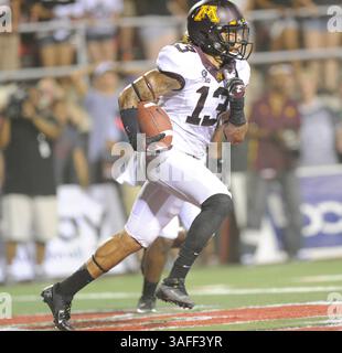 2012 août 30 : Derrick Wells (13) et Keanon Cooper (51) du Minnesota ...