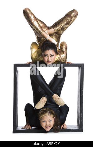 Female contortionist duo avec fort prop Photo Stock - Alamy