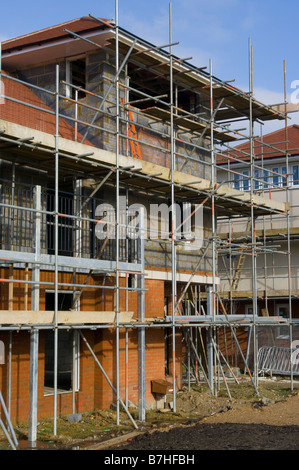 Échafaudage Échafaudages de construction les travailleurs de la ...