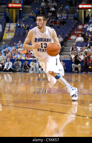 Indiana State's Jake Odum (13) drives around Joe Ragland (1) during the ...