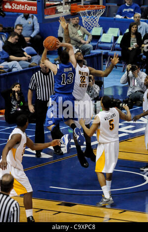Indiana State's Jake Odum (13) drives around Joe Ragland (1) during the ...