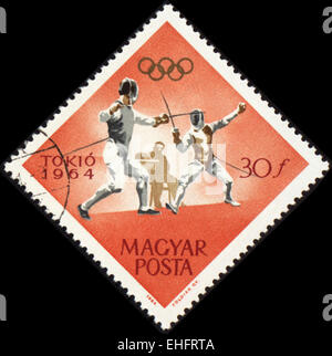 Hongrie - circa 1964 : timbres en Hongrie, montre anneaux olympiques ...