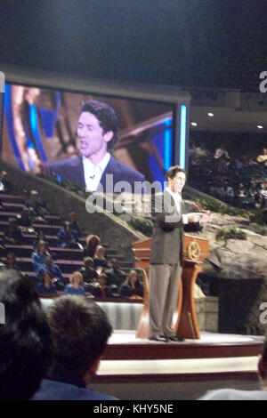 Lakewood Church pastor Joel Osteen, with his wife Victoria, center and daughter Alexandra, right ...