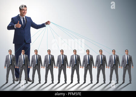 Patron employé manipulant son personnel au concept d'entreprise Photo ...