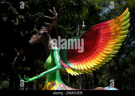 A giant alebrije is paraded through Mexico City, Saturday, Oct. 20 ...