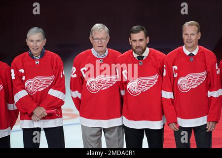 Former Detroit Red Wings captains Red Berenson, from left, Paul Woods ...