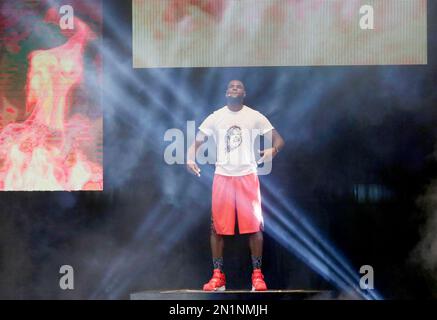 NBA basketball player LeBron James, center, poses with his high school ...