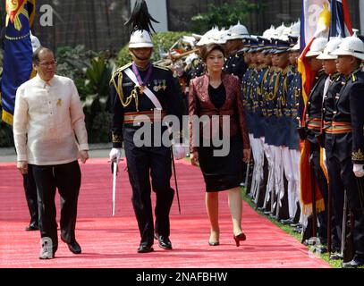 President Benigno Aquino III, left, celebrates Christopher Bernido and ...