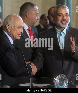 Gaza's Hamas Prime Minister Ismail Haniyeh, center, and Fathi Hamad ...