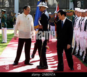 President Benigno Aquino III, left, celebrates Christopher Bernido and ...