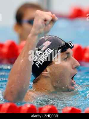 Aaron Peirsol, of the United States, celebrates after winning a gold ...