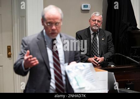 Prosecutor Creighton Waters questions his witness during the double ...