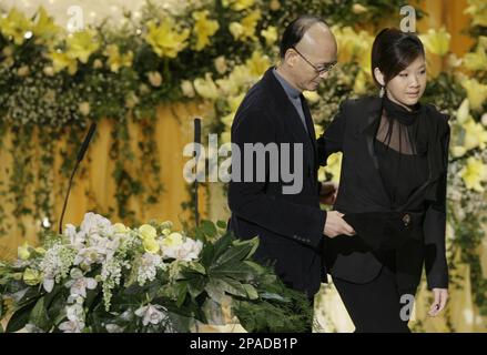 Lydia Sum's ex-husband Adam Cheng, left, and her daughter Joyce Cheng ...