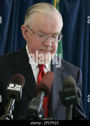 Naveed Afzal Haq , left, talks with his attorney,C. Wesley Richards ...