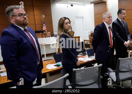 Assistant State Attorney Kristen Gomes confers with Assistant State ...