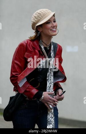 Australian pop star Delta Goodrem, poses for photos as she arrives at ...